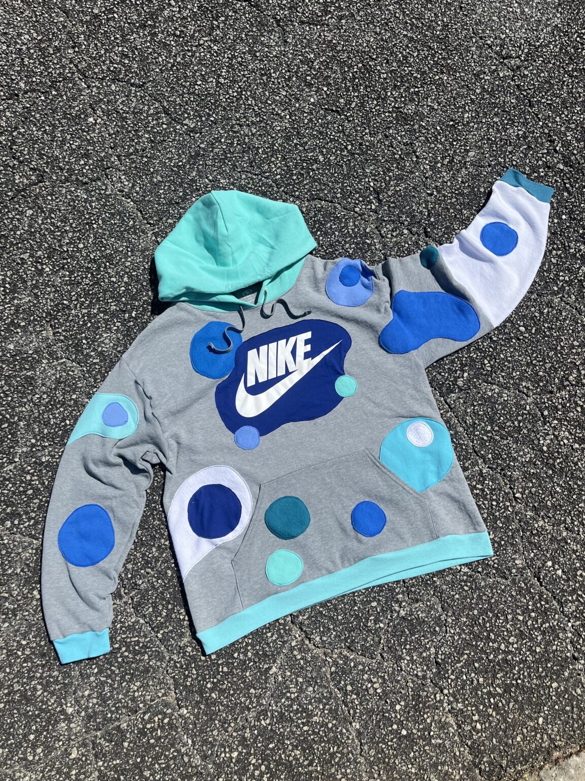 Reworked Nike hoodie | RE.STATEMENT | The Upcycled Fashion Marketplace